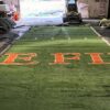 Basic Quality Used Logo Marked Turf | 15ft. Wide | Shipped