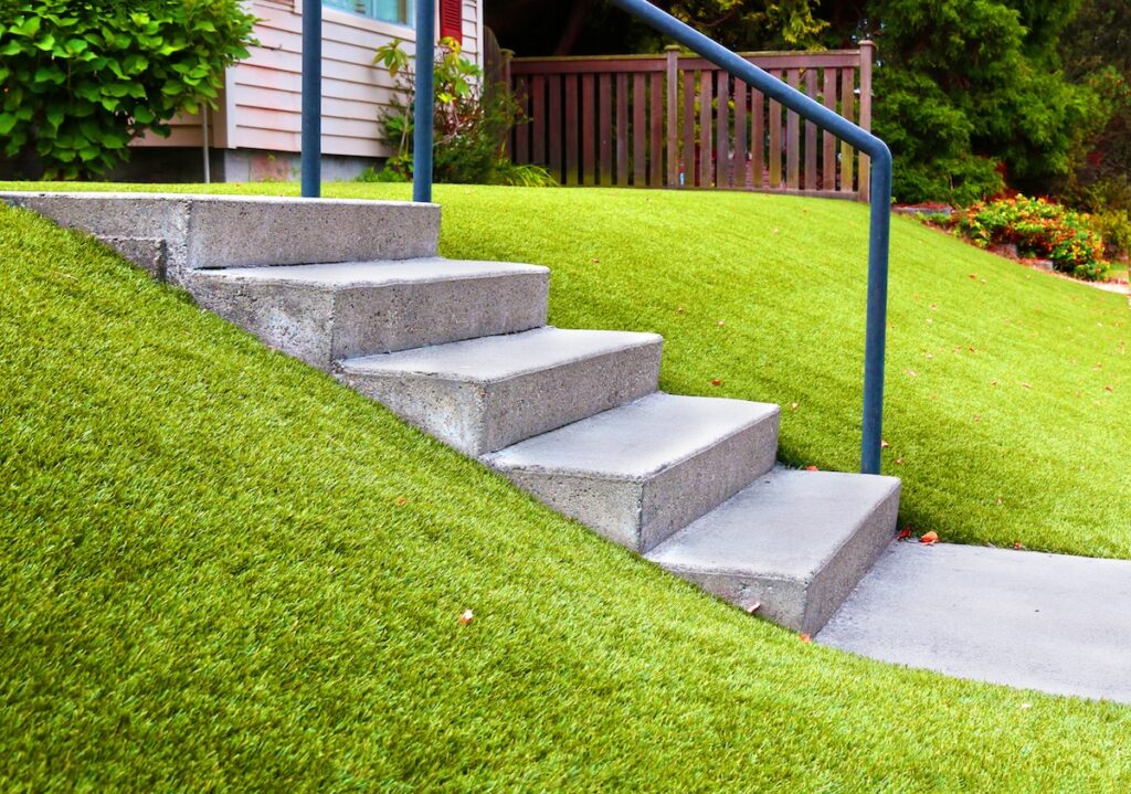 Installing Artificial Turf on Hills, Slopes, & Uneven Ground - ReTurf